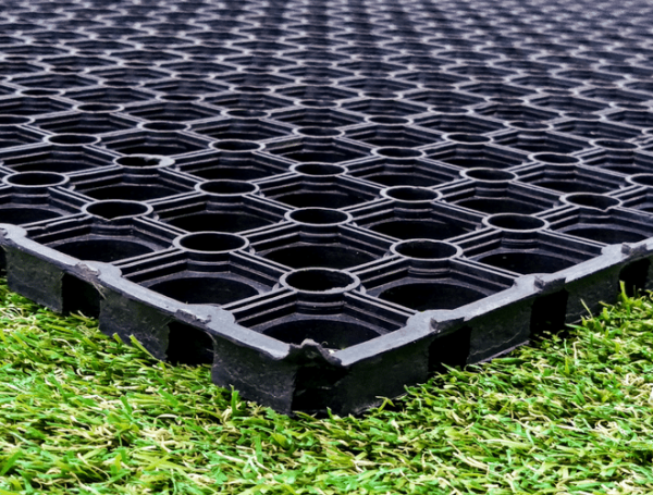 Rubber Grass Mats Installed Under A Garden Playarea